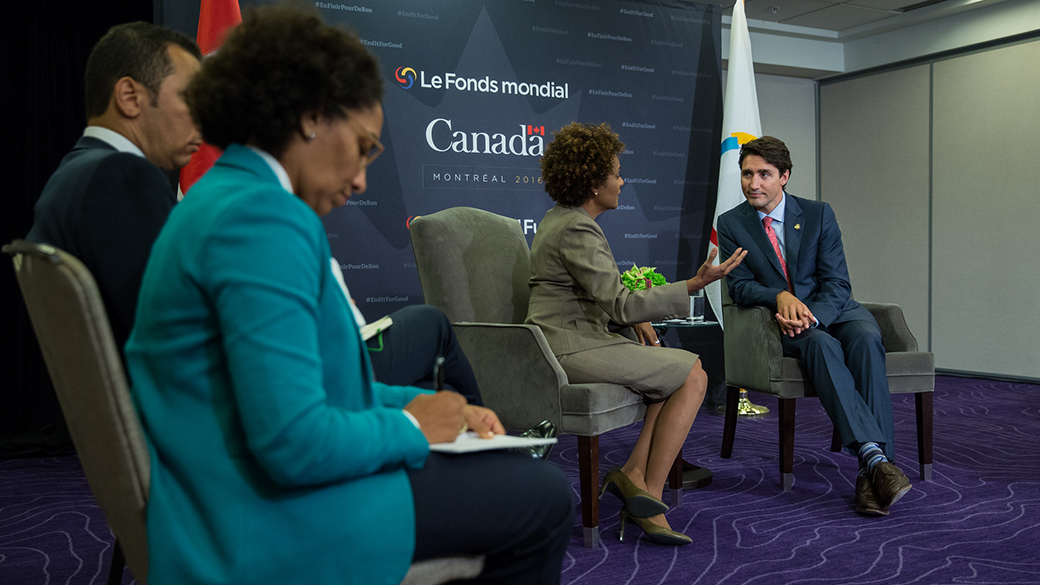 Prime Minister Justin Trudeau speaks with the Secretary General of the ...