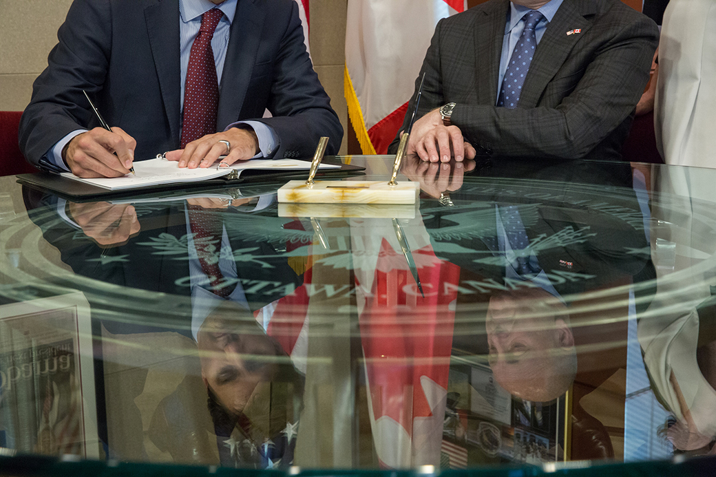Prime Minister Justin Trudeau signs a condolence book for the victims ...