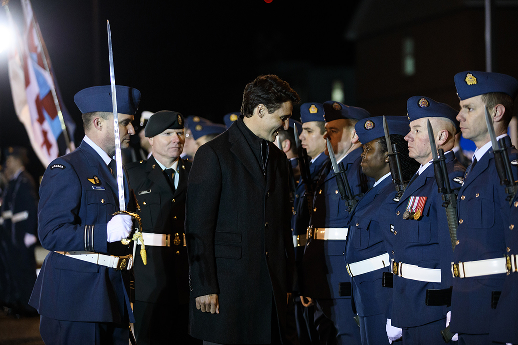 Prime Minister Justin Trudeau attends an Honour Guard at the CFB ...