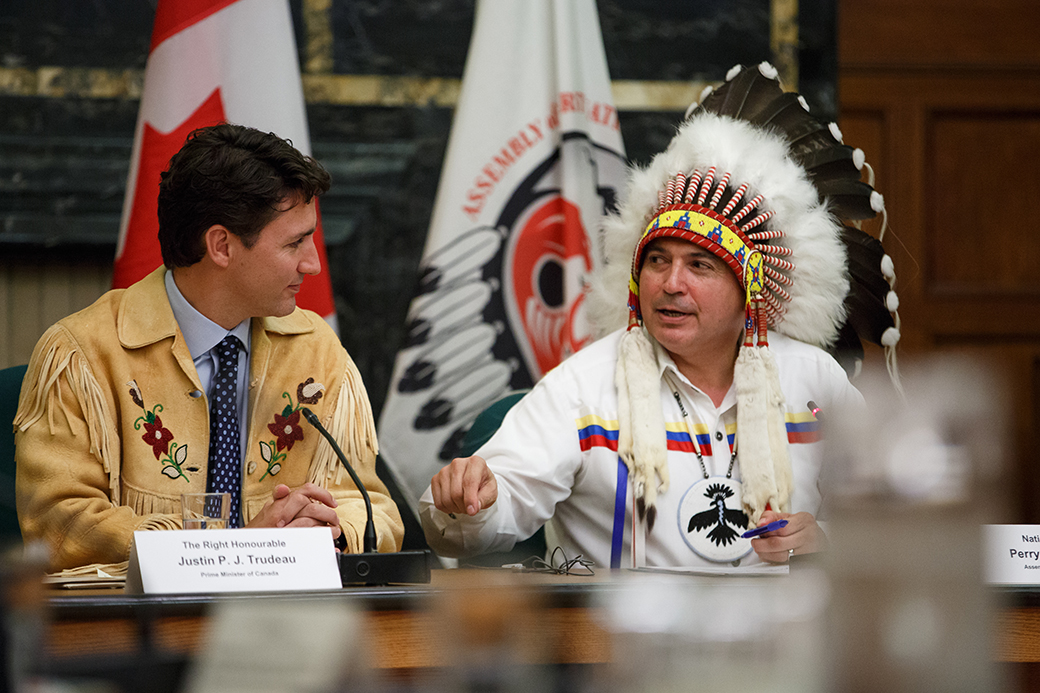 Prime Minister Justin Trudeau participates in the signing of the ...