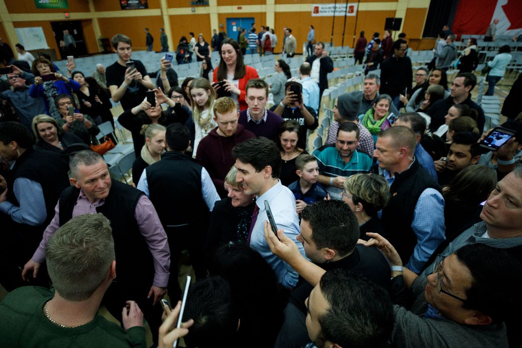 Prime Minister Justin Trudeau and MP Darrell Samson answer questions ...