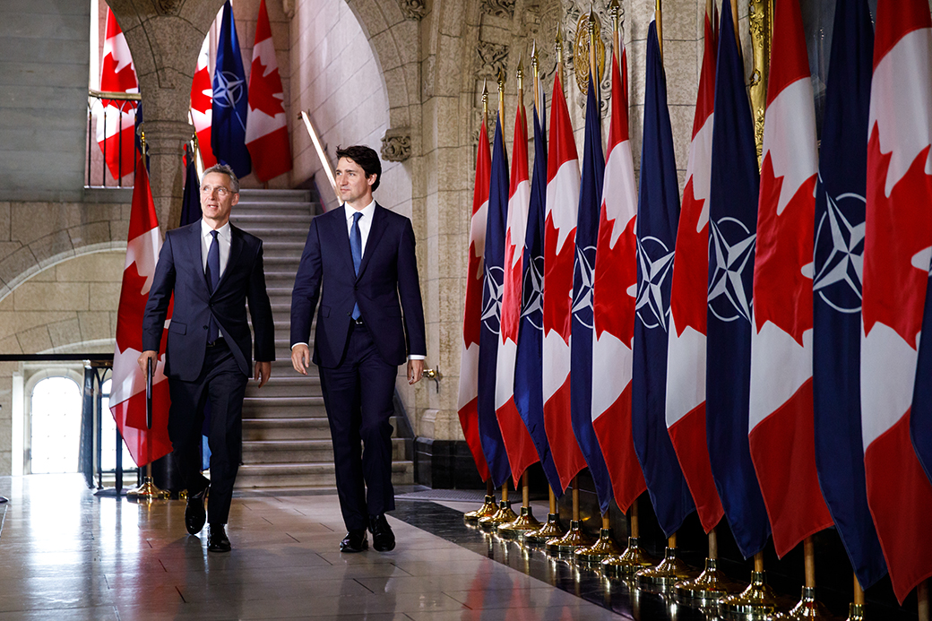 Prime Minister Justin Trudeau and NATO Sec. Gen. Jens Stoltenberg speak ...