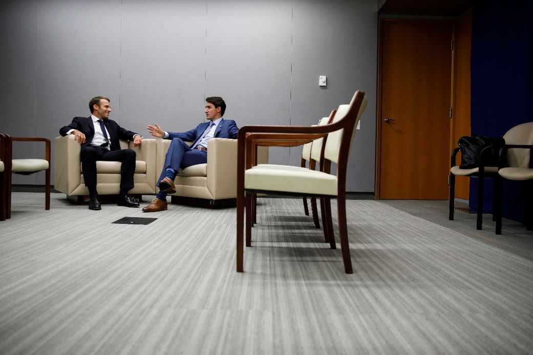 Prime Minister Justin Trudeau speaks with the President of France ...