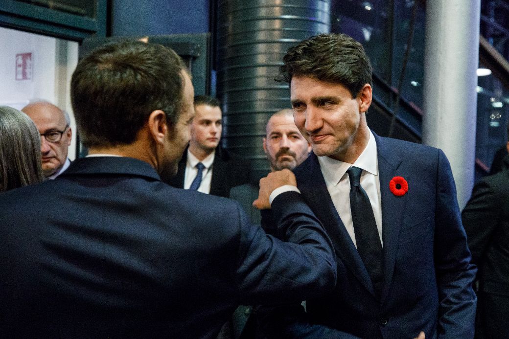 Prime Minister Justin Trudeau speaks with the President of France ...