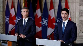 Prime Minister Justin Trudeau and NATO Sec. Gen. Jens Stoltenberg speak ...