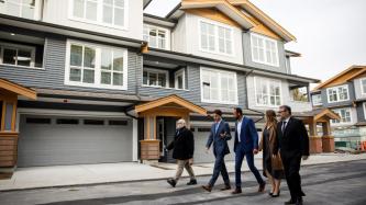 Prime Minister Trudeau, MPs McKinnon and Ruimy make a housing ...